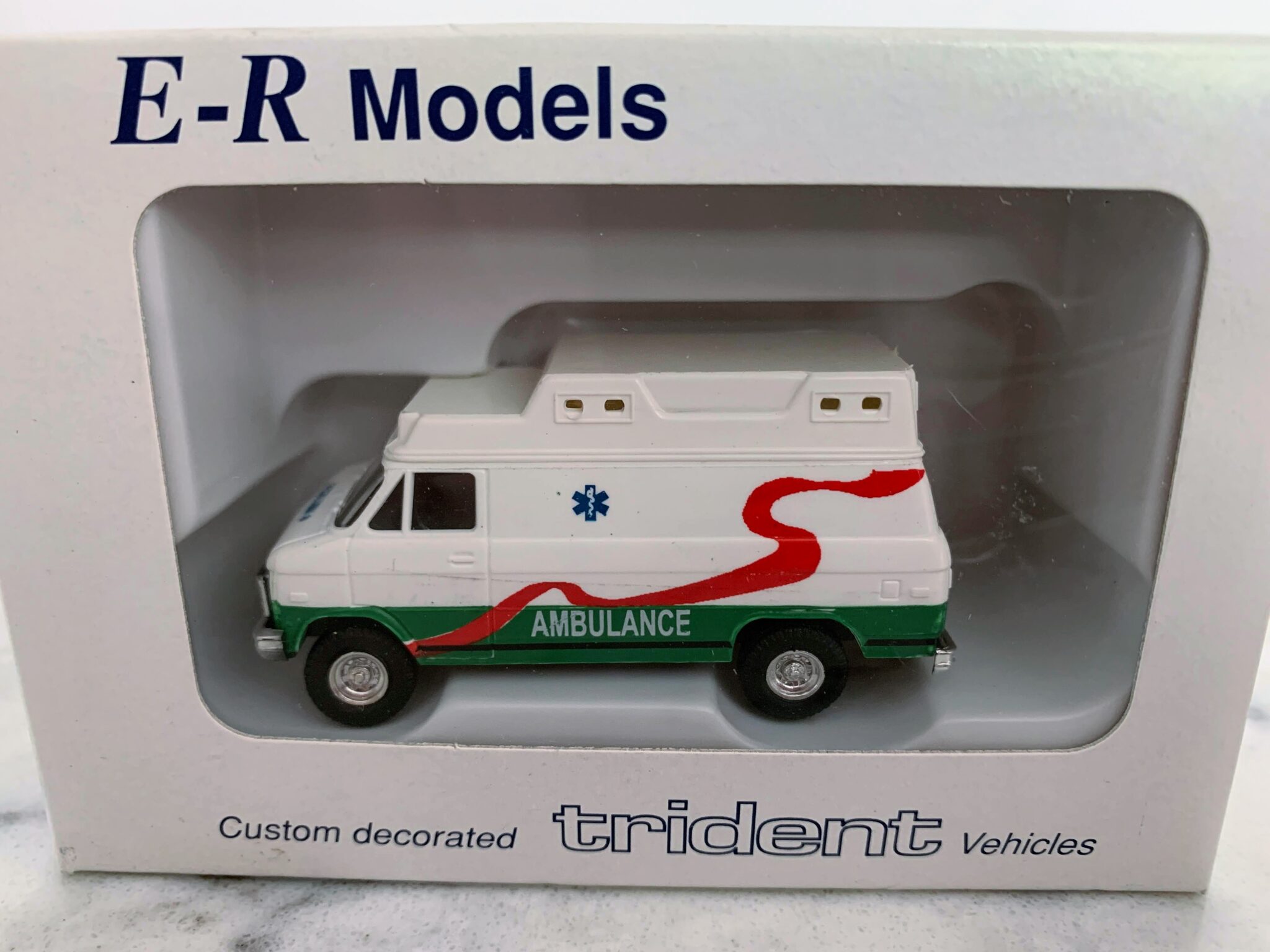 Ambulance White and Green, Unmarked - The Fire Bell